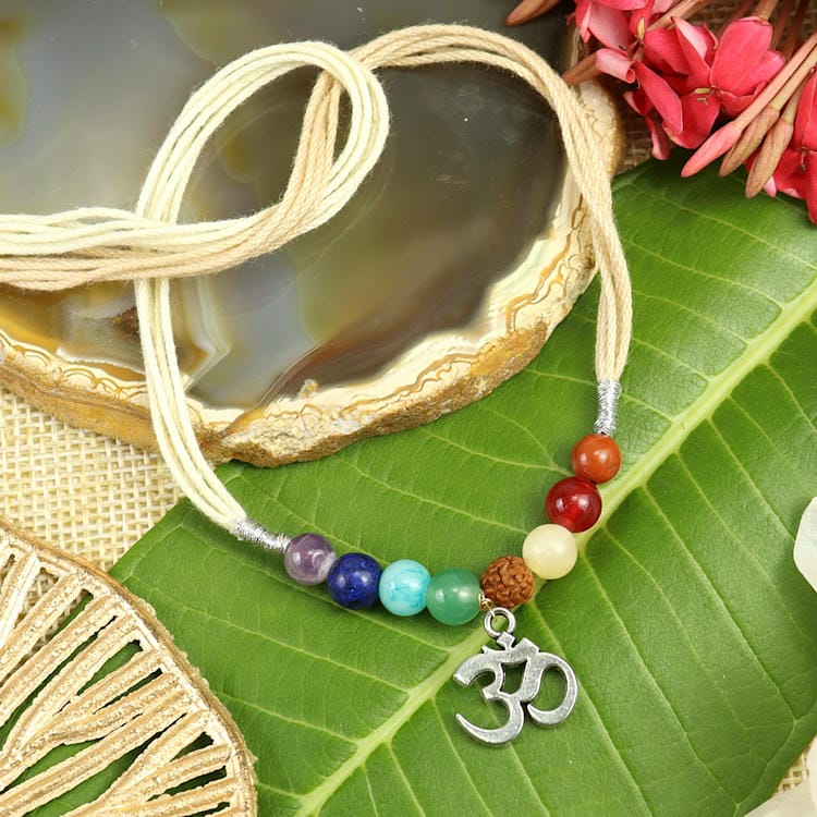 Seven Chakras Stone Healing Om Rakhi Packed in a Features Card for ...